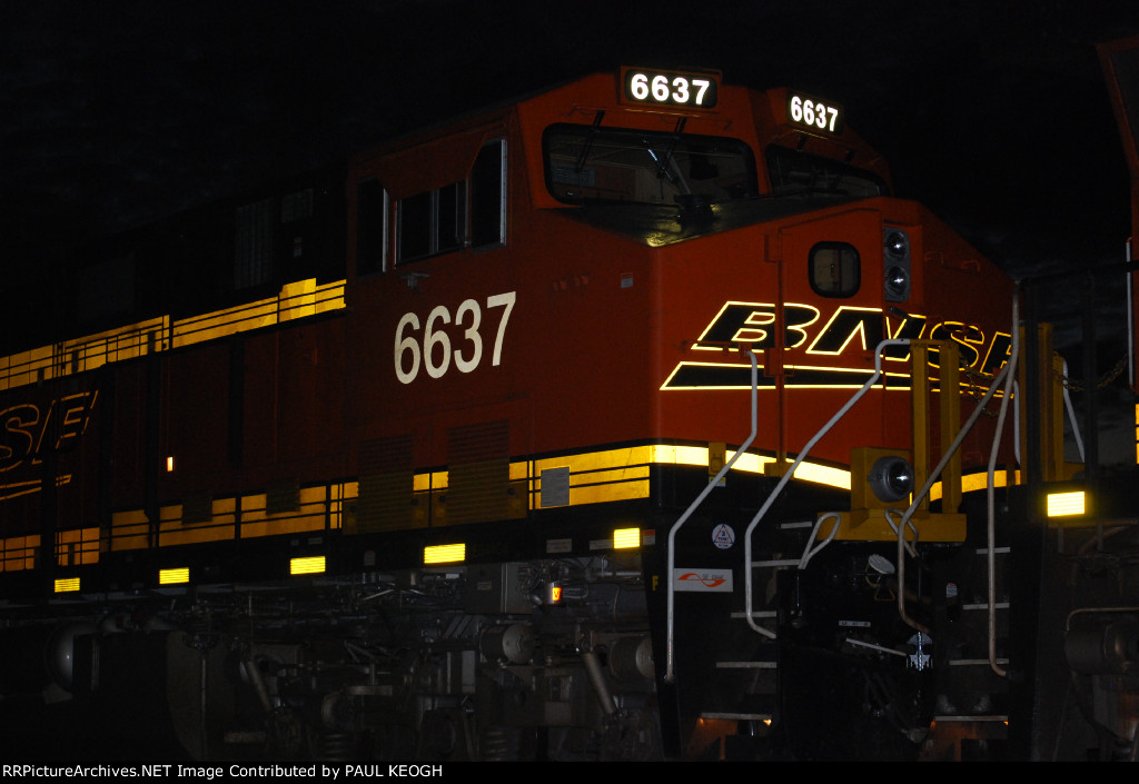 The LED Road Number Lights of BNSF 6637 stand out with her BNSF reflective Swoosh Logo in this ...